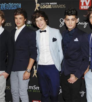 One Direction to have 100 bodyguards for world tour | Music News | Zee News
