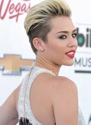 Miley Cyrus disses Selena Gomez on stage with song `Fu` | And More ...