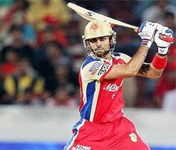 Original Kohli signed bat and ball up for auction | Cricket News | Zee News