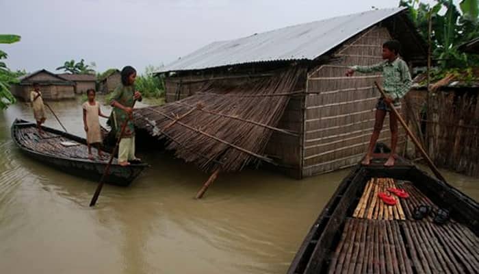 Over 12 lakh affected in Assam floods | Assam News | Zee News