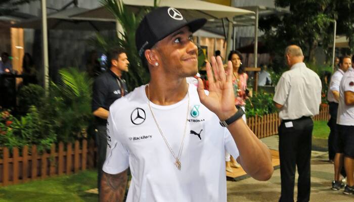 Lewis Hamilton strikes first blow in Singapore | Motorsports News | Zee ...