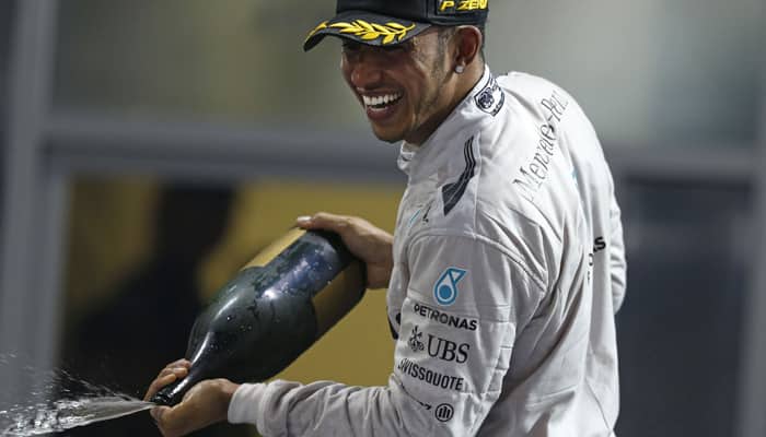 Greatest moment in my life, says Lewis Hamilton after winning second F1 ...