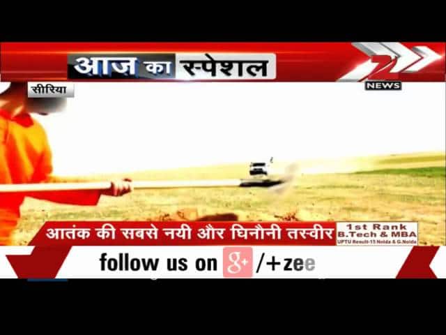 Watch: ISIS prisoner digging his own grave | Zee News