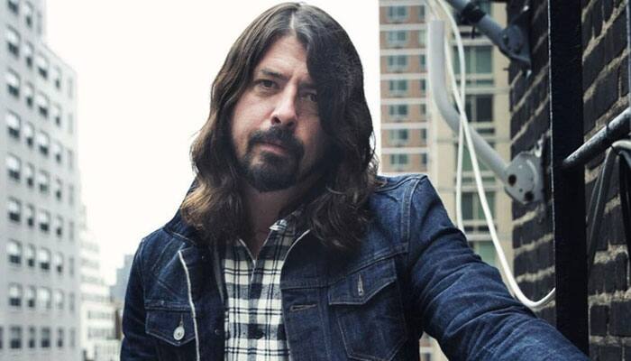 Dave Grohl resurfaces with crutches after leg injury in Sweden | And ...