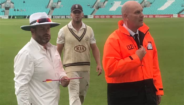 Match between Surrey, Middlesex suspended as crossbow bolt lands on ...