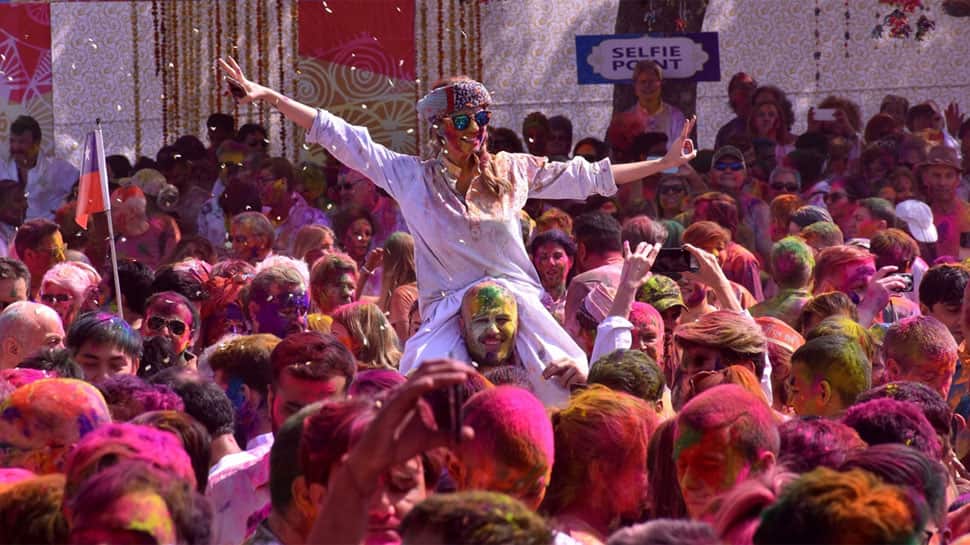 Photos: Holi celebrated with fervour across India | News | Zee News