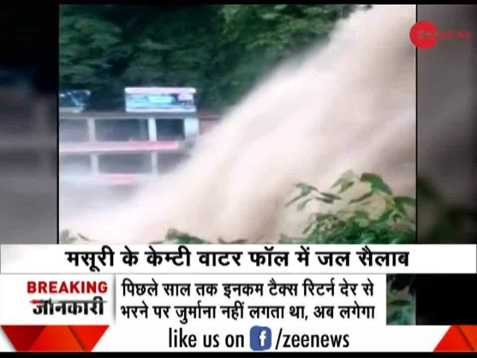 Heavy rainfall triggers flooding in Mussoorie's Kempty Fall | Zee News