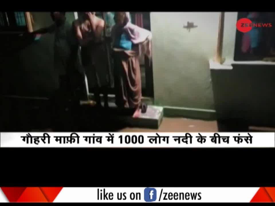 More than 1000 people stuck in Rishikesh floods; NDRF ops on | Zee News