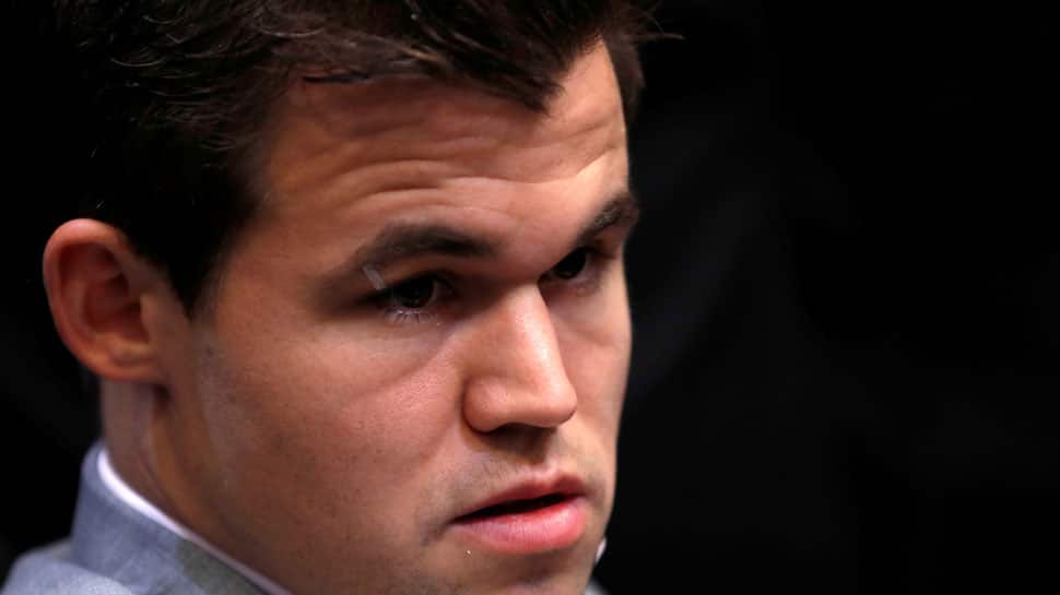 Norway's Magnus Carlsen wins World Chess Championship for fourth time ...