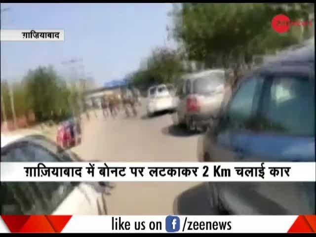 Viral Video: Man drags cab driver on bonnet for 2 Km in Ghaziabad | Zee News