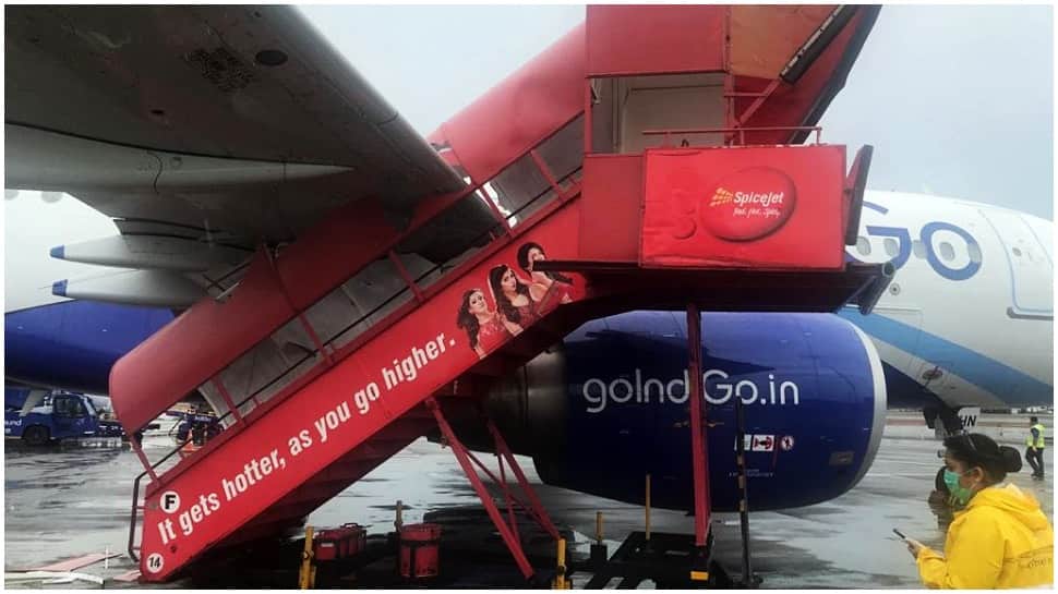 Spicejet ladder rams into parked IndiGo plane due to strong winds at ...