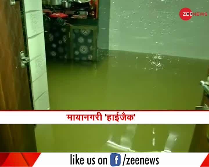 Massive flooding and destruction after heavy rain, strong winds batter Mumbai | Zee News