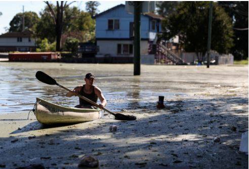Floods wreak havoc in Australia, claim 2 lives- See pics | News | Zee News