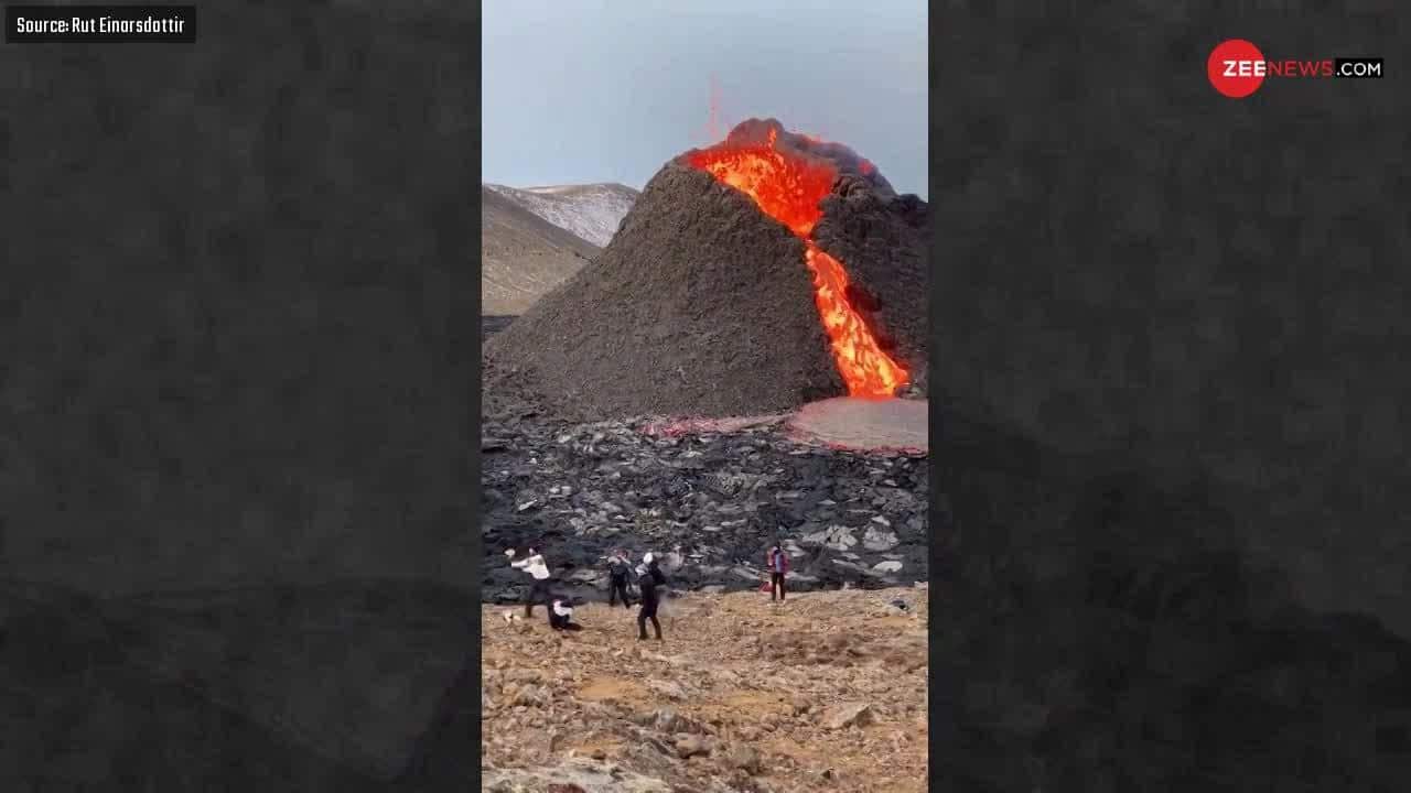 Viral Video: People playing volleyball near erupted volcano | Zee News