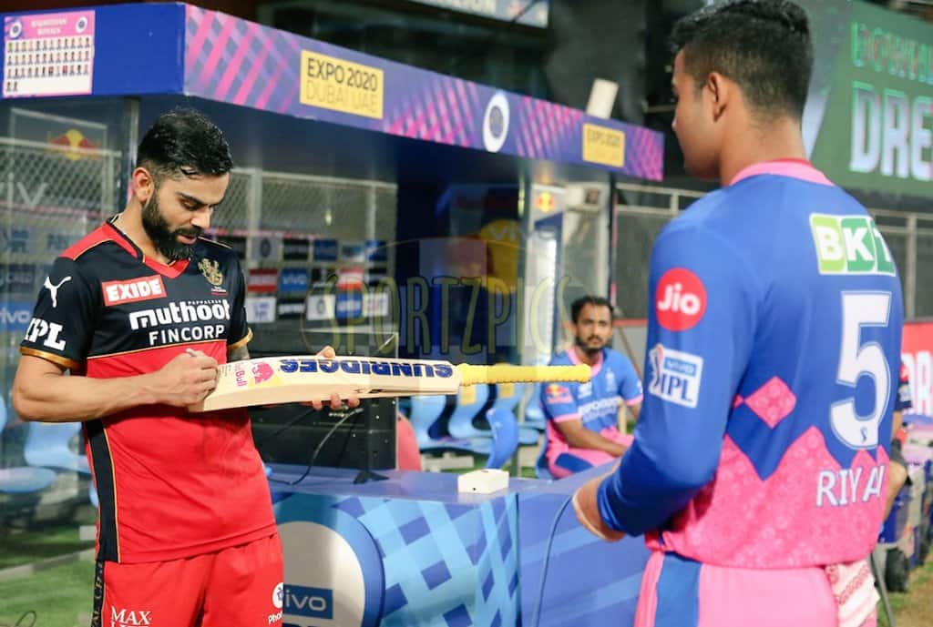 IPL 2021: Virat Kohli does a MS Dhoni, fulfils Riyan Parag’s ‘fan ...