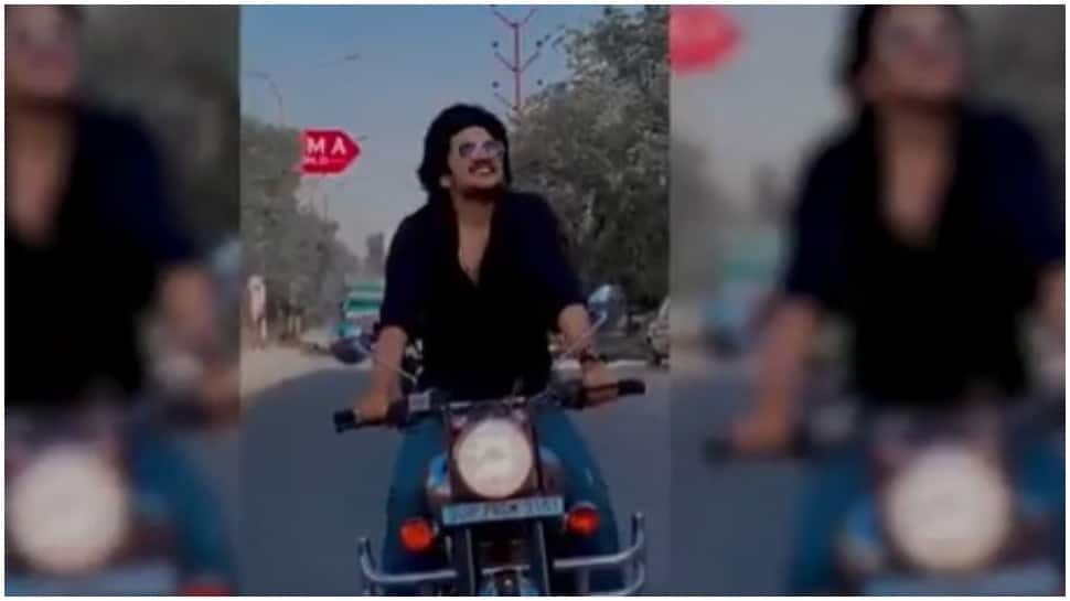 Man makes reels on bike without helmet, UP police issue pun-filled ...