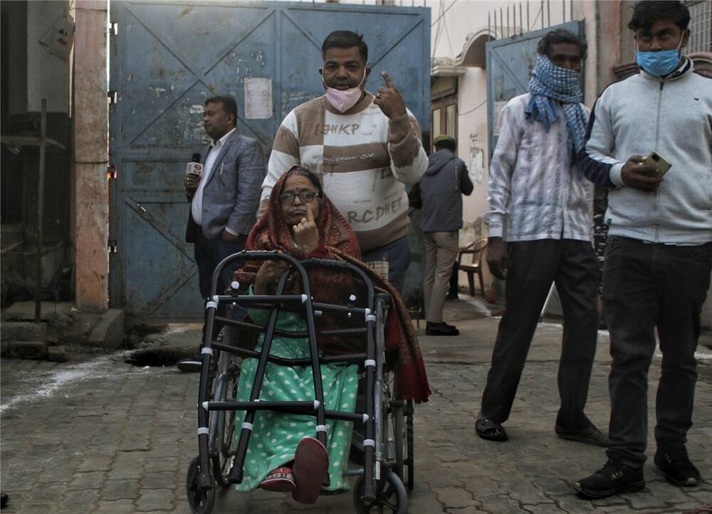 Third phase of UP assembly polls see voters in full flare - In pics ...