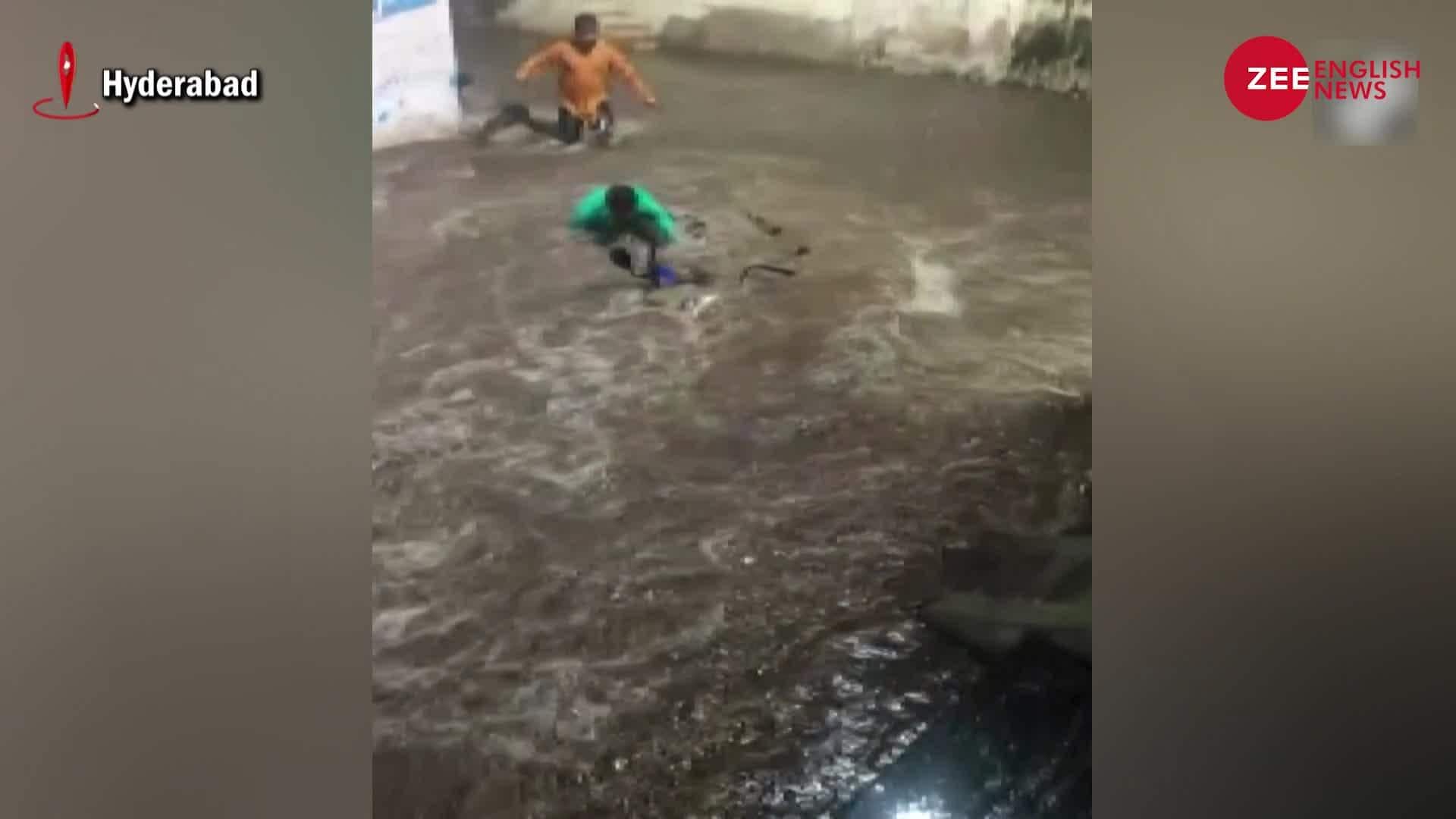 Hyderabad: Man along with two-wheeler washed away in Borabanda | Zee News