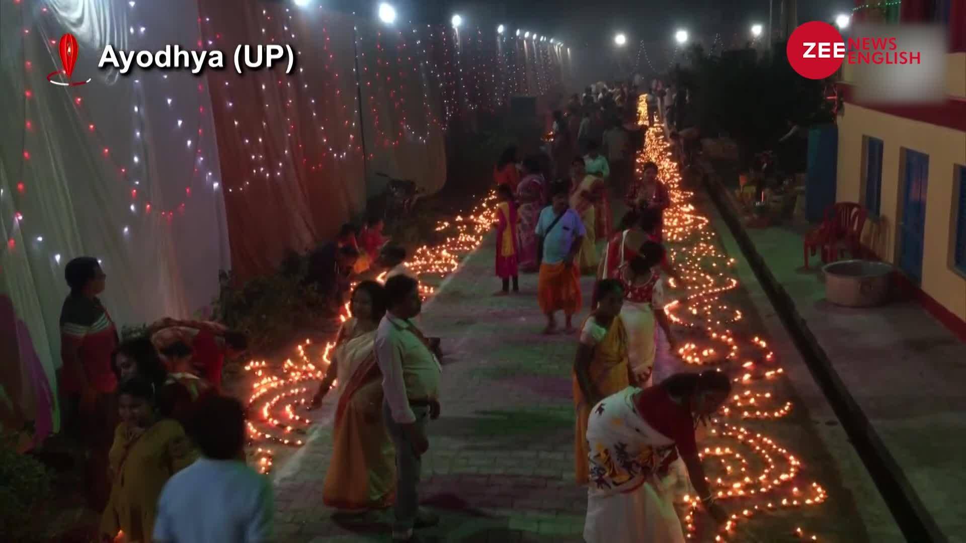 Dev Deepawali 2022: Devotees light 1 lakh diyas in Ayodhya | Zee News