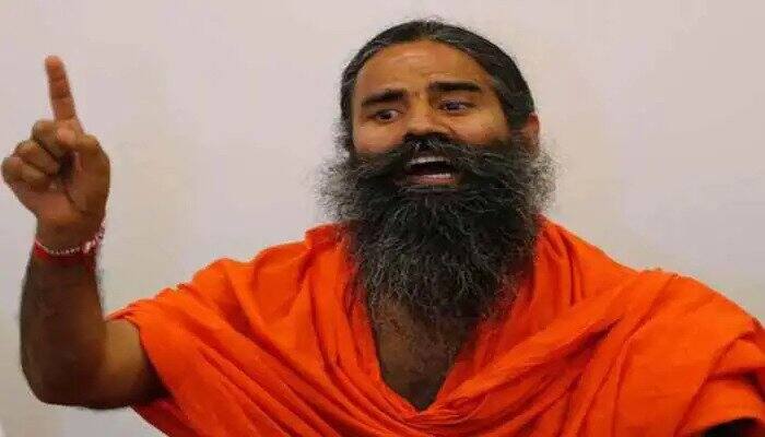 Two cartoonists booked for making obscene posters of Baba Ramdev in ...