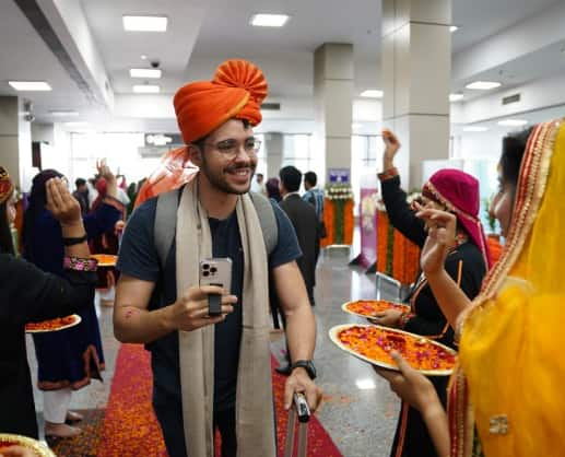 150 foreign delegates from 25 countries...all welcomed with 'saffron ...