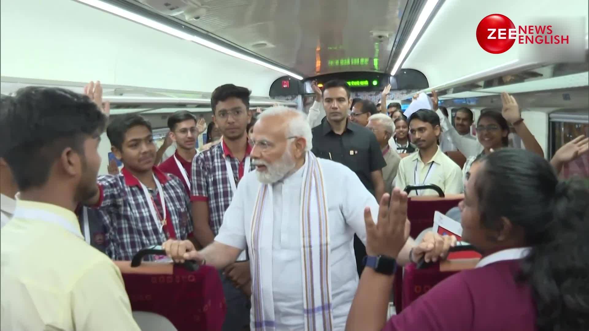 PM Modi Interacts With Students While Traveling In The Vande Bharat ...