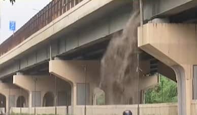 Watch exclusive visuals of how water is flushing out of pipes from Flyover | Zee News