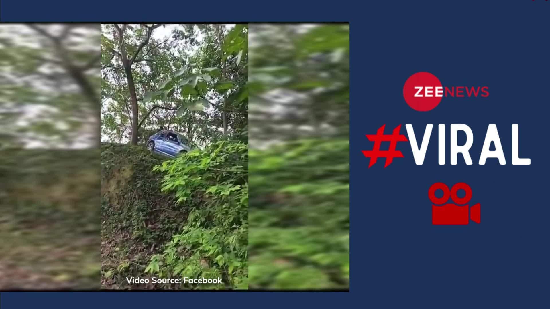 Viral Video: Car Stuck Between Trees on Hill Slope, Netizens Share ...