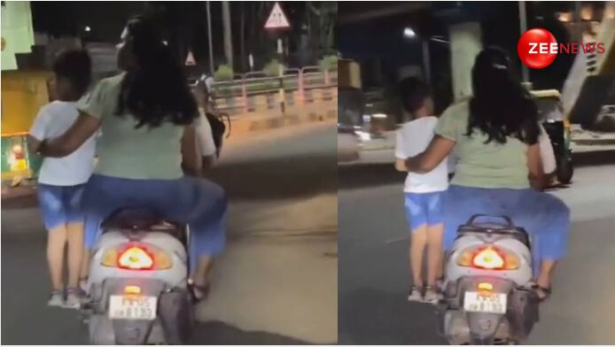 Bengaluru Couple's Scooter Ride Video With Child Standing On Footrest Sparks Outrage | Zee News