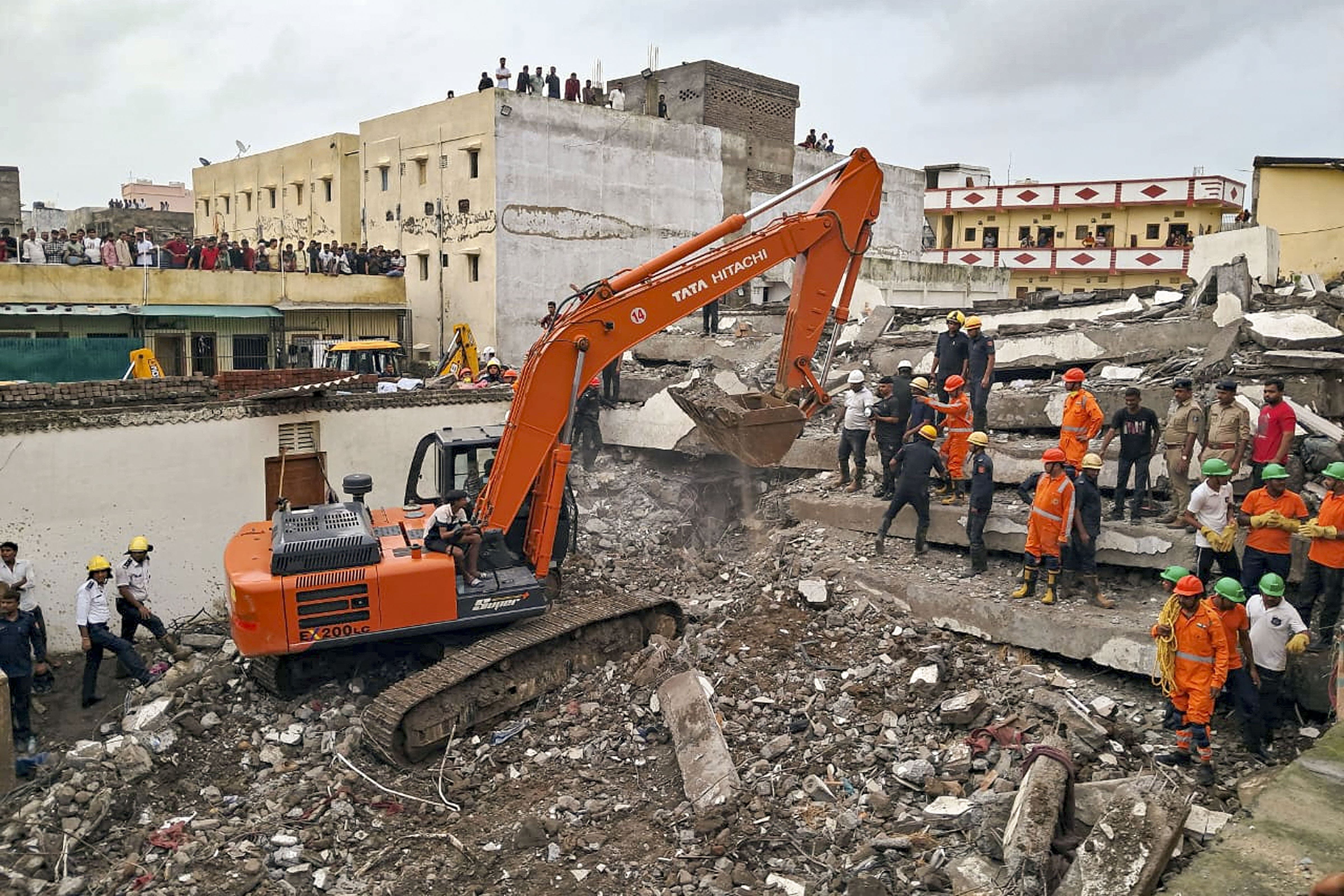 Watch: 7 Dead, Many Trapped As 6-Storey Building Collapses In Gujarat's ...