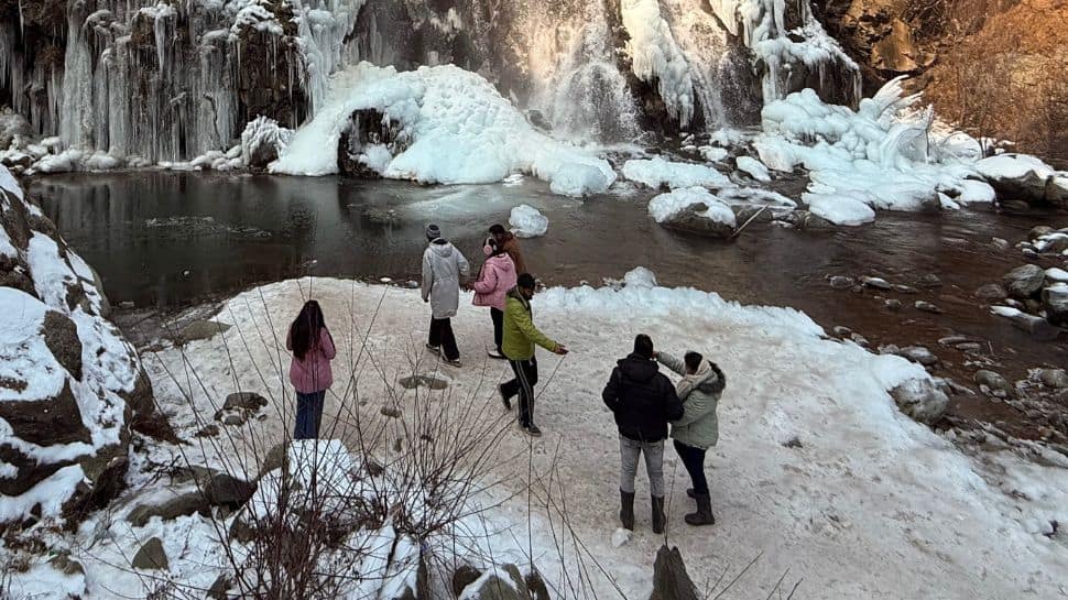 Kashmir's Winter Wonderland: Drang Waterfall Transforms Into a Frozen ...