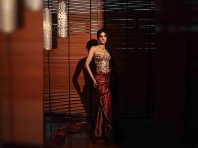 Disha Patani wears a red hot Kanijvaram corset saree by Tarun Tahiliani ...
