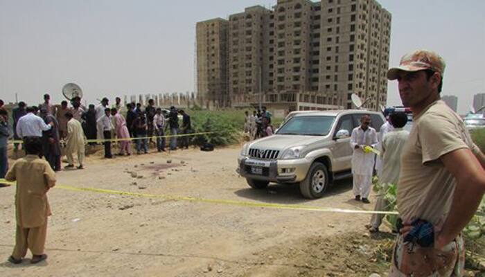 At least 45 killed in Karachi bus attack, Islamic State claims ...