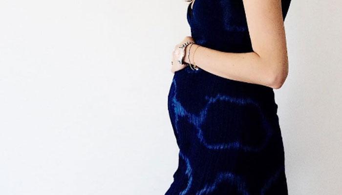 This supermodel’s photos prove bikini baby bump is in vogue | People ...