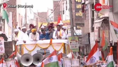 Arvind Kejriwal, Bhagwant Mann hold roadshow in Hisar, Haryana | Zee News