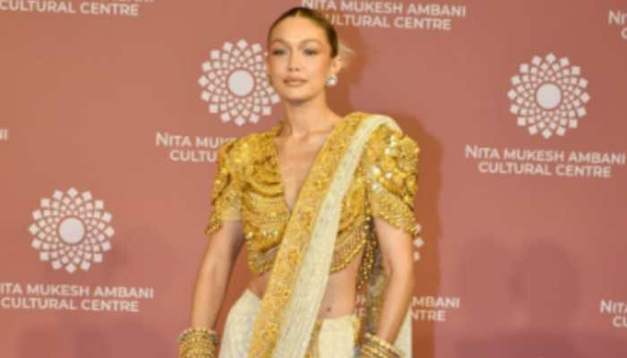 NMACC Day 2: Gigi Hadid Stuns In White Saree With Golden Work ...