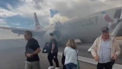 US Aircraft Catches Fire Pre-Takeoff; Dramatic Evacuation Unfolds On ...