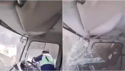 Caught on camera: Terrifying landslide video captures trucks toppling ...